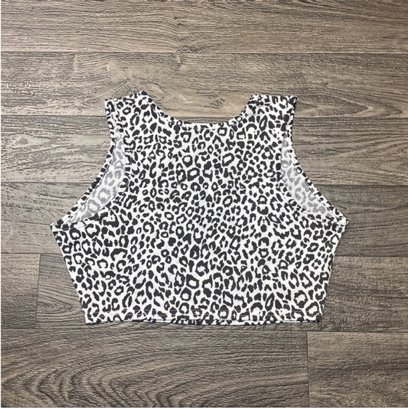 PrettyLittleThing | Tops | White Jersey Leopard Print Racer Crop Top ...